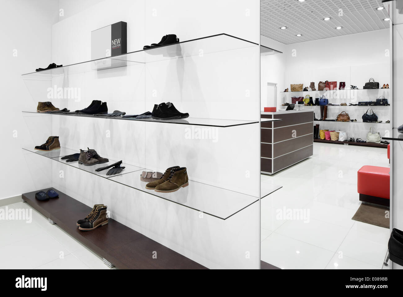 bright and fashionable interior of shoe store in modern mall Stock ...