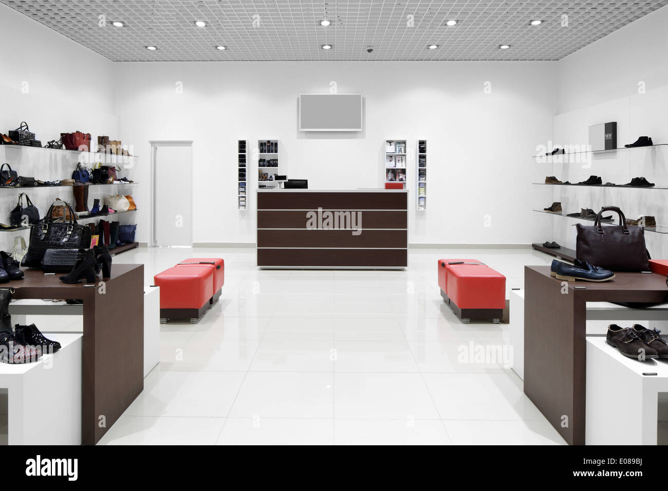 bright and fashionable interior of shoe store in modern mall Stock ...