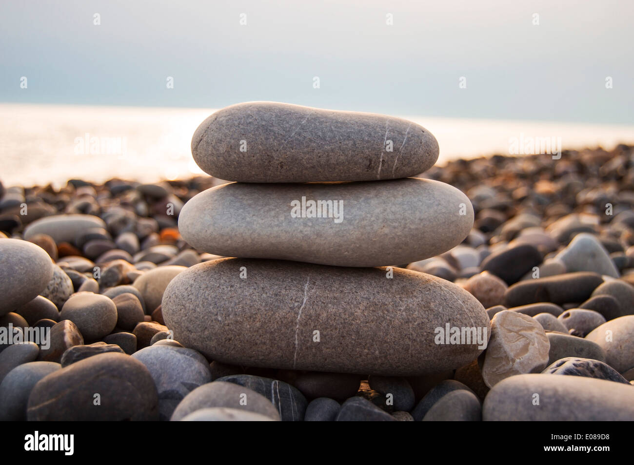 beach pebbles balance Stock Photo - Alamy