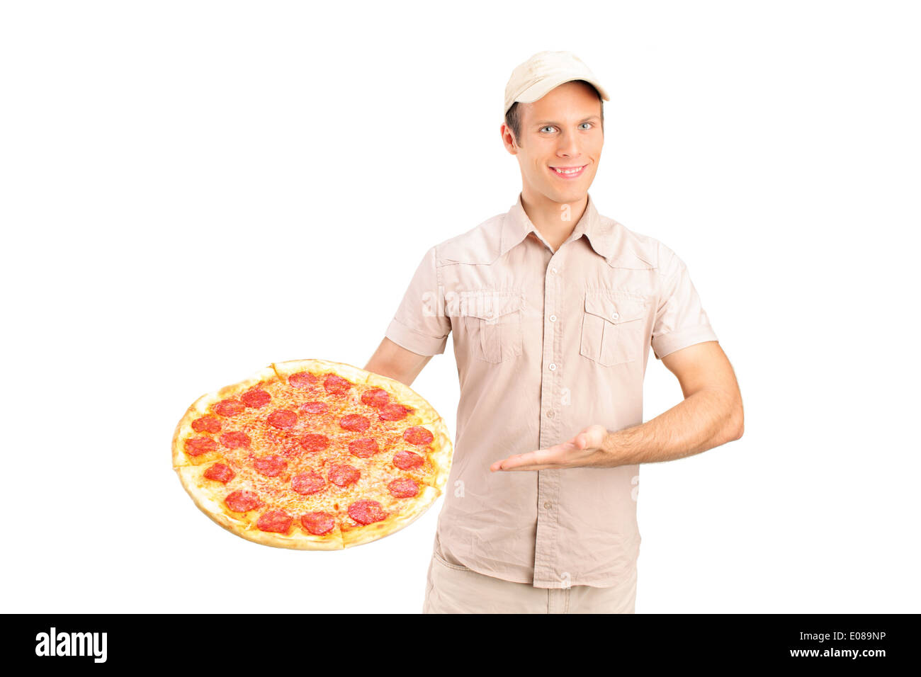 Delivery guy holding a pizza Stock Photo - Alamy