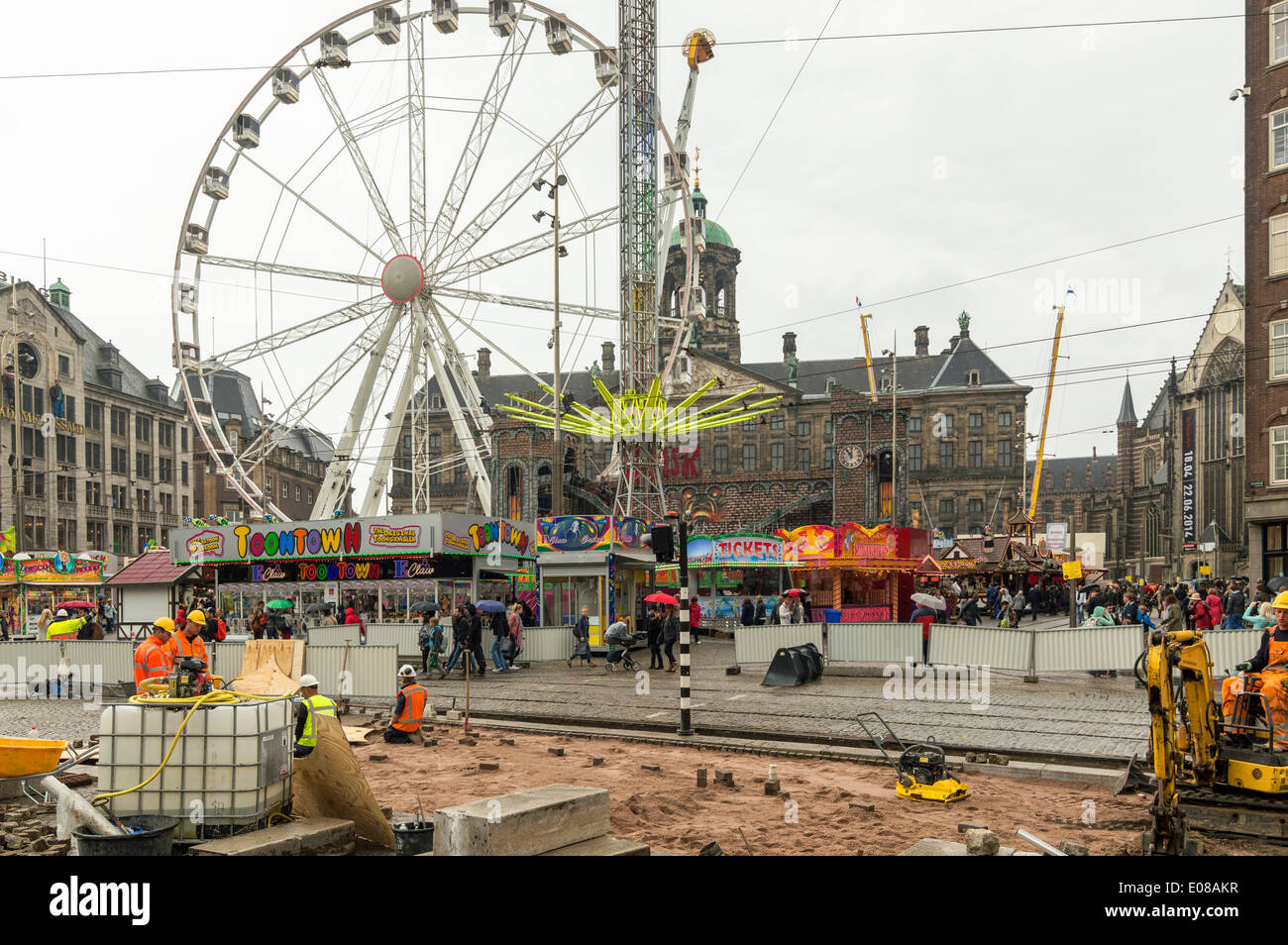 AMSTERDAM AND DAM SQUARE FILLED WITH A FUN FAIR AND AMUSEMENT RIDES ...