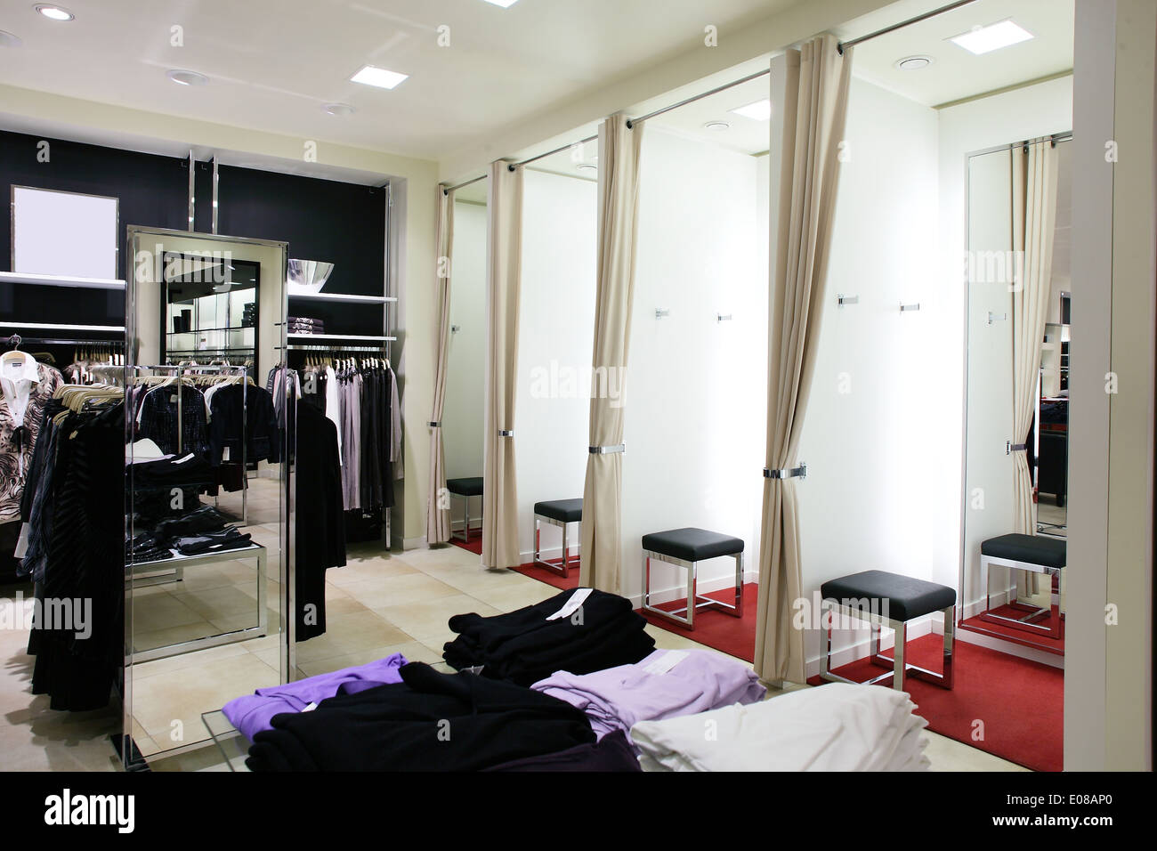 luxury and fashionable brend new interior of cloth store Stock Photo ...