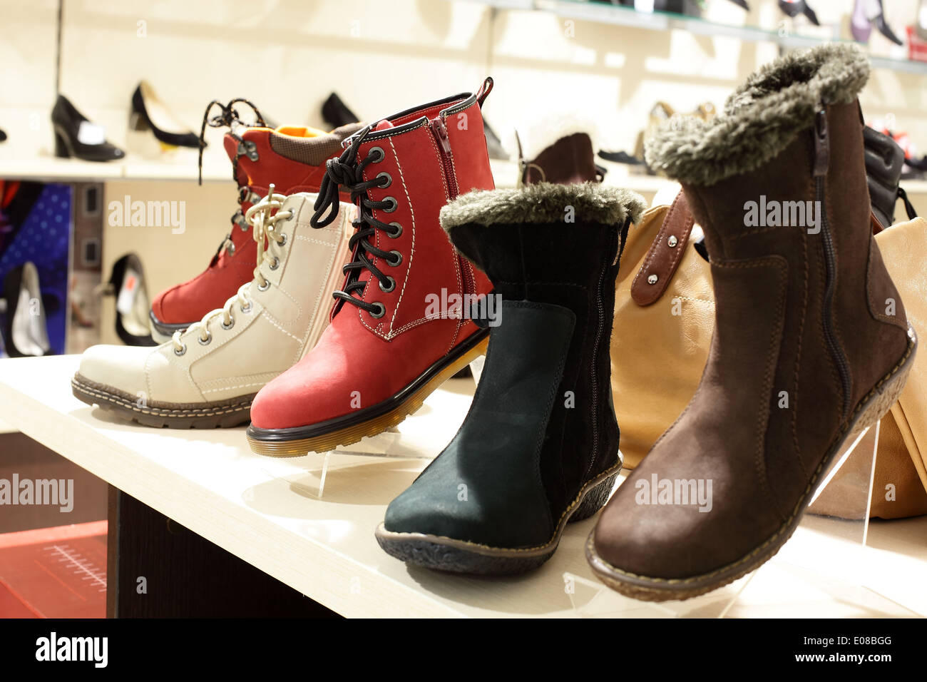 bright and fashionable interior of shoe store in modern mall Stock ...