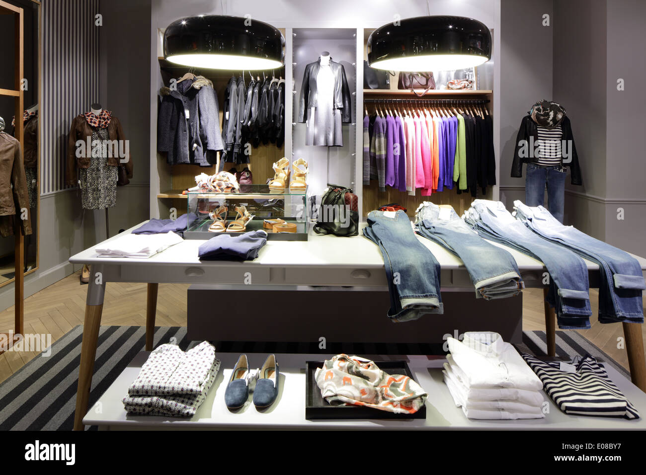 luxury and fashionable brend new interior of cloth store Stock Photo ...