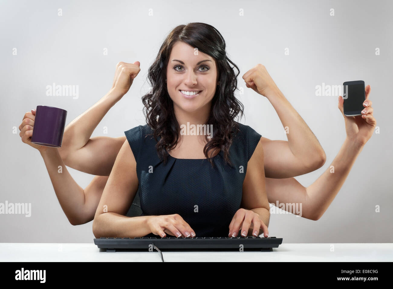 busy business woman multitasking in the office with six arms Stock ...