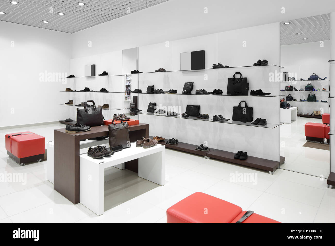 bright and fashionable interior of shoe store in modern mall Stock ...