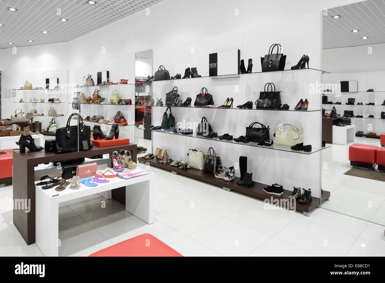 bright and fashionable interior of shoe store in modern mall Stock ...