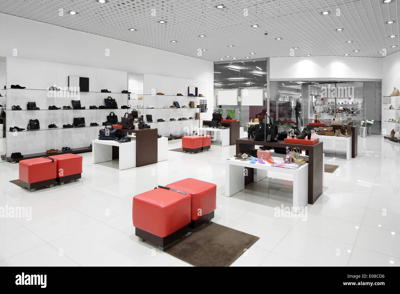 bright and fashionable interior of shoe store in modern mall Stock ...