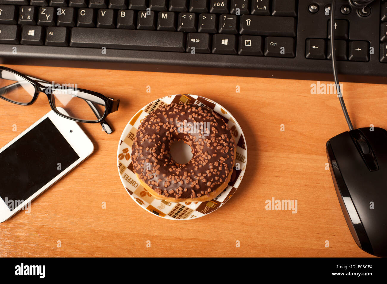 doughnut and office table Stock Photo - Alamy