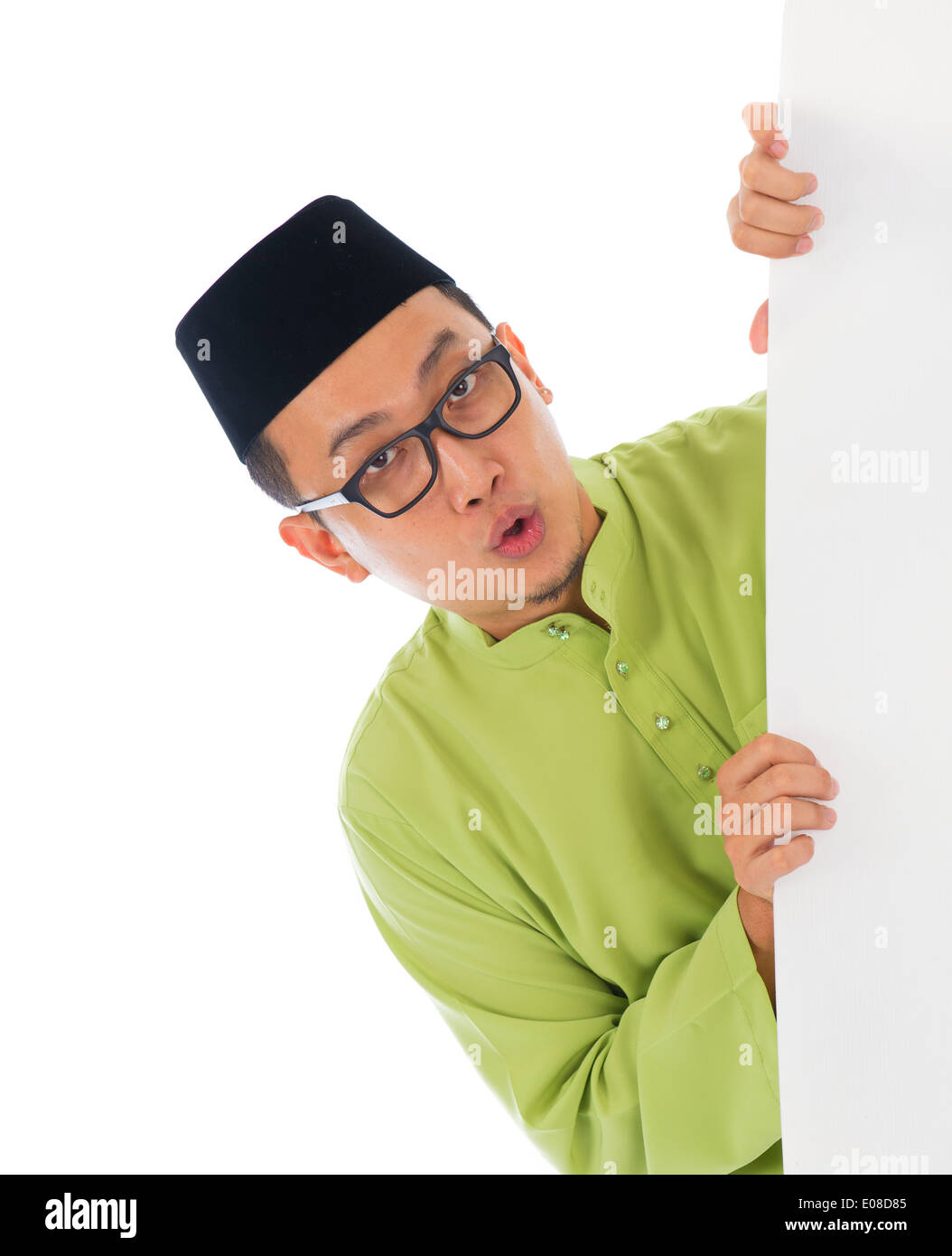malay male with blank card during hari raya Eid al-Fitr aidilfitri ...