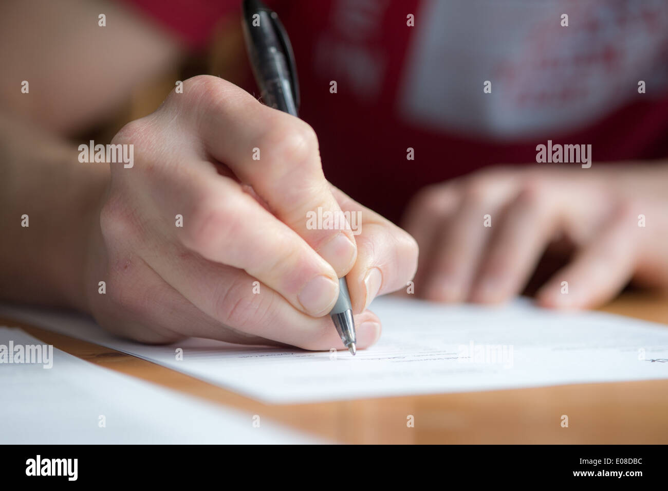 Close-up of male hand writing Stock Photo - Alamy