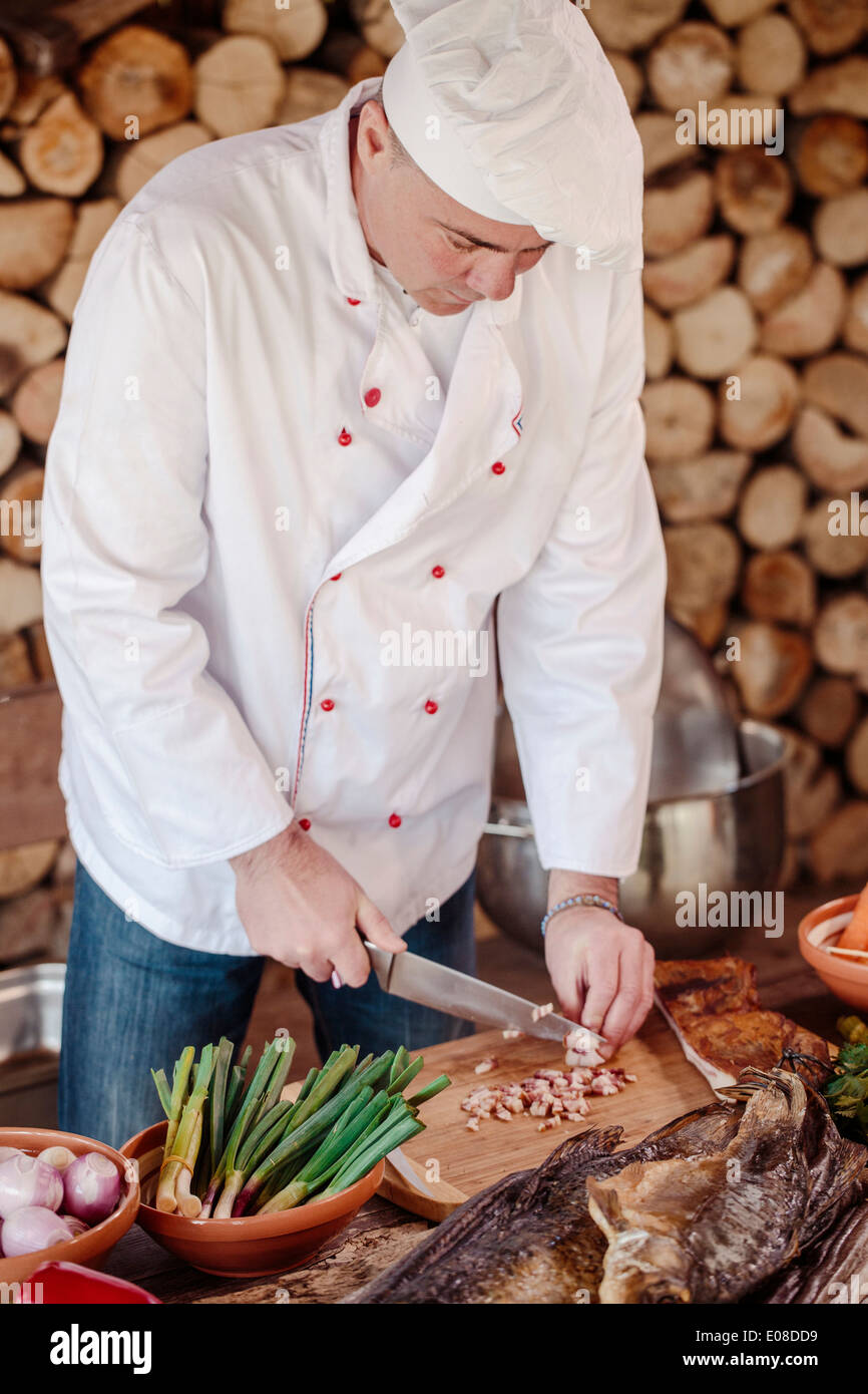 Cutting vegetable hi-res stock photography and images - Alamy