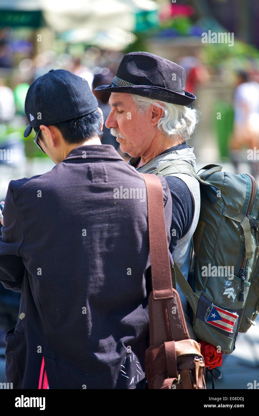 Two Men Talking In Bryant Park New York City Stock Photo - Alamy