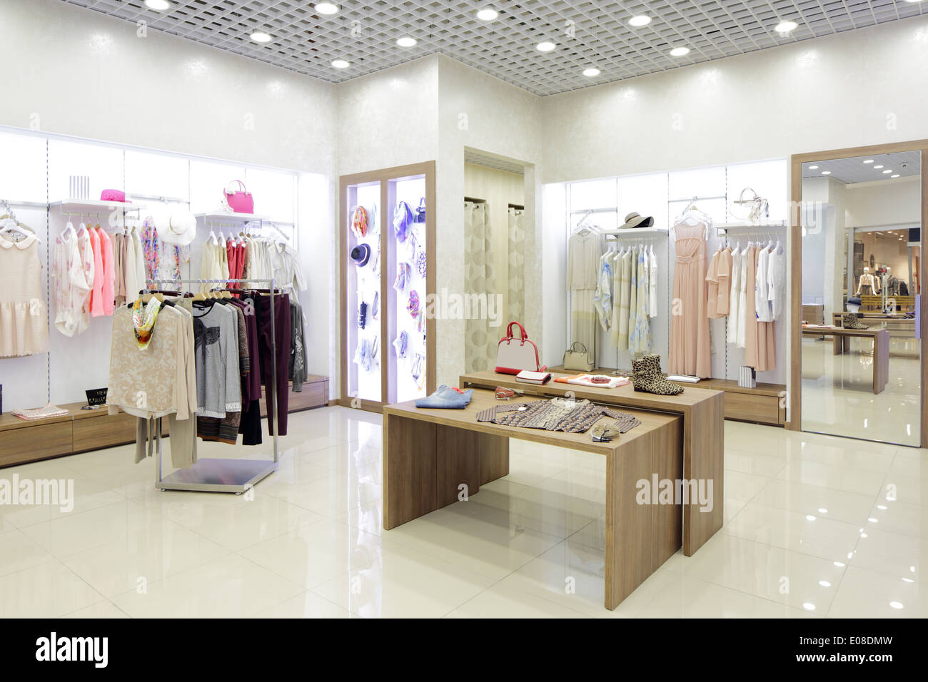 luxury and fashionable brand new interior of cloth store Stock Photo ...
