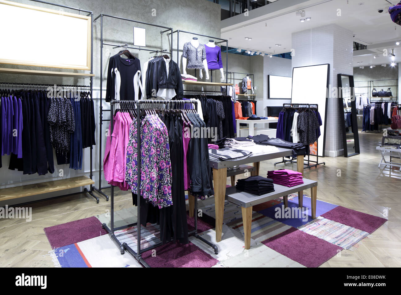 luxury and fashionable brand new interior of cloth store Stock Photo ...