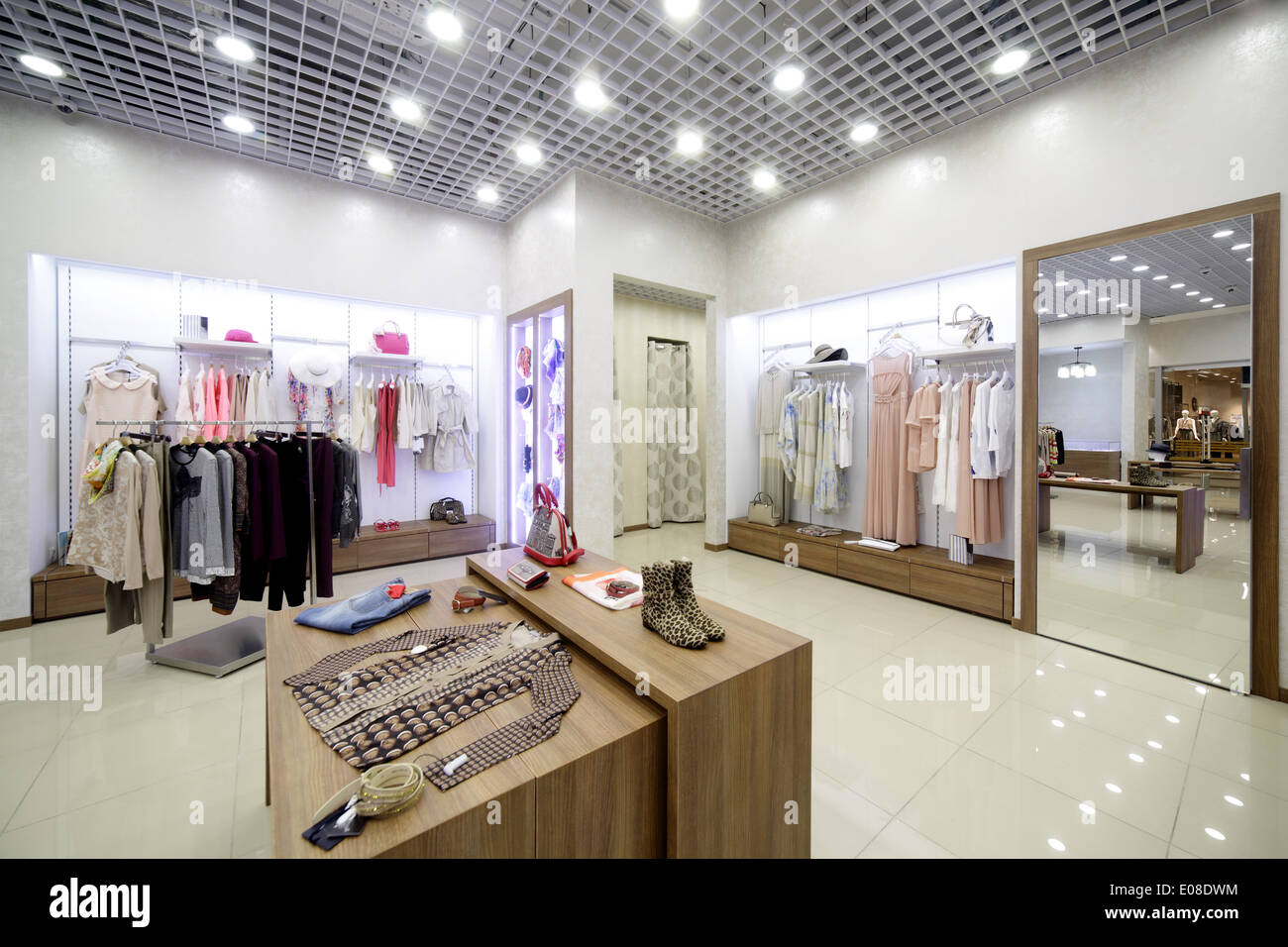 luxury and fashionable brand new interior of cloth store Stock Photo ...