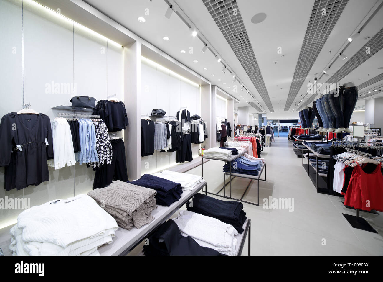 luxury and fashionable brand new interior of cloth store Stock Photo ...