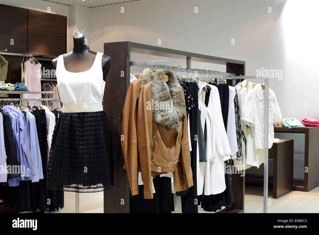 luxury and fashionable brand new interior of cloth store Stock Photo ...