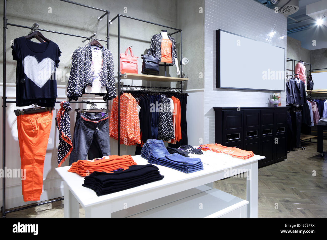 luxury and fashionable brand new interior of cloth store Stock Photo ...