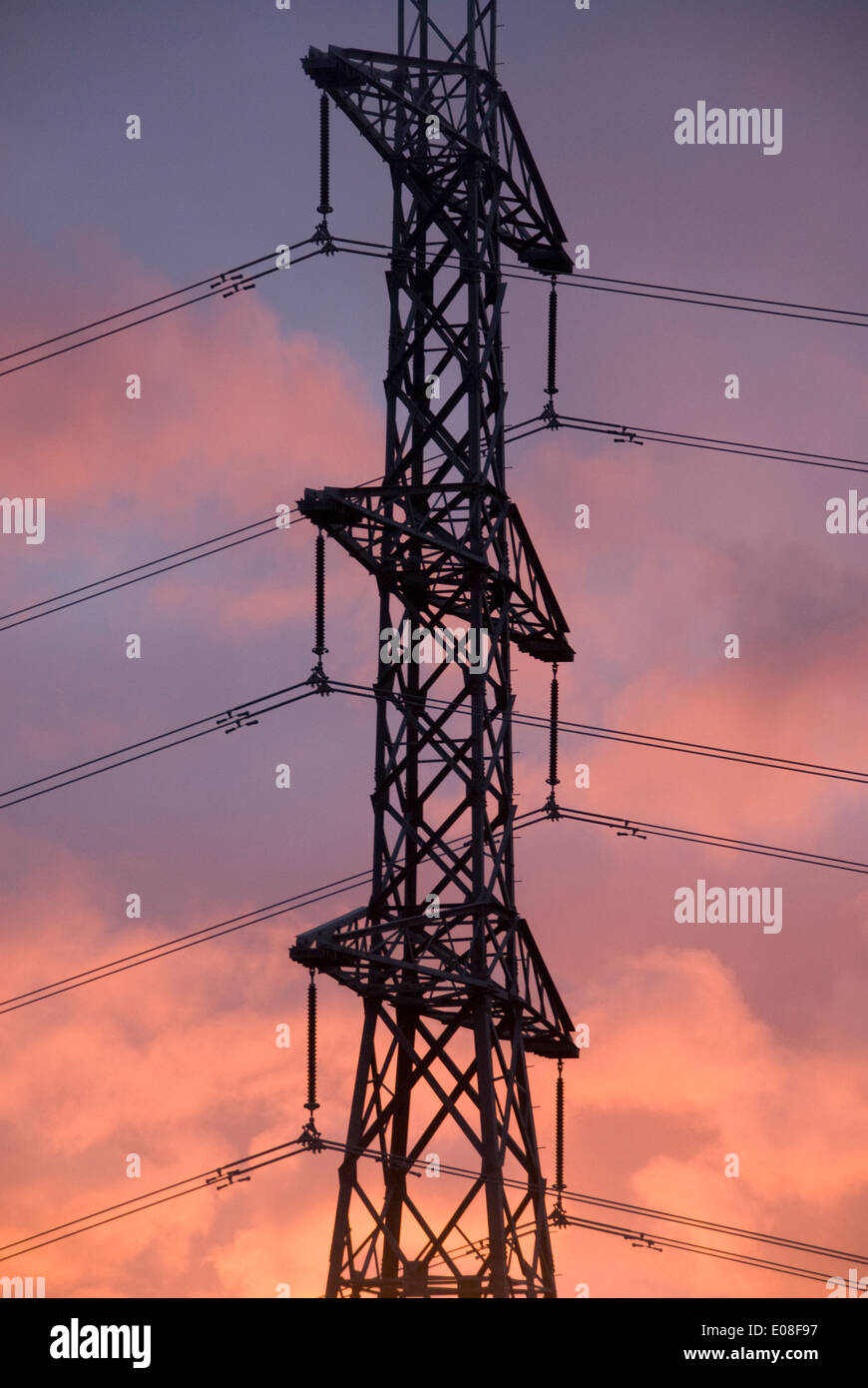 Red clouds at sunset behind power pylon, Belmont Regional Park ...