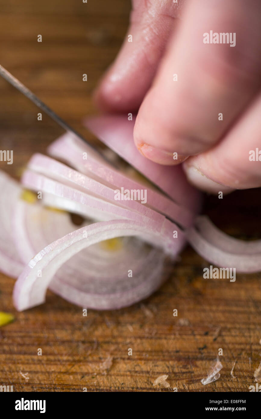 Cutting raw onions hi-res stock photography and images - Alamy