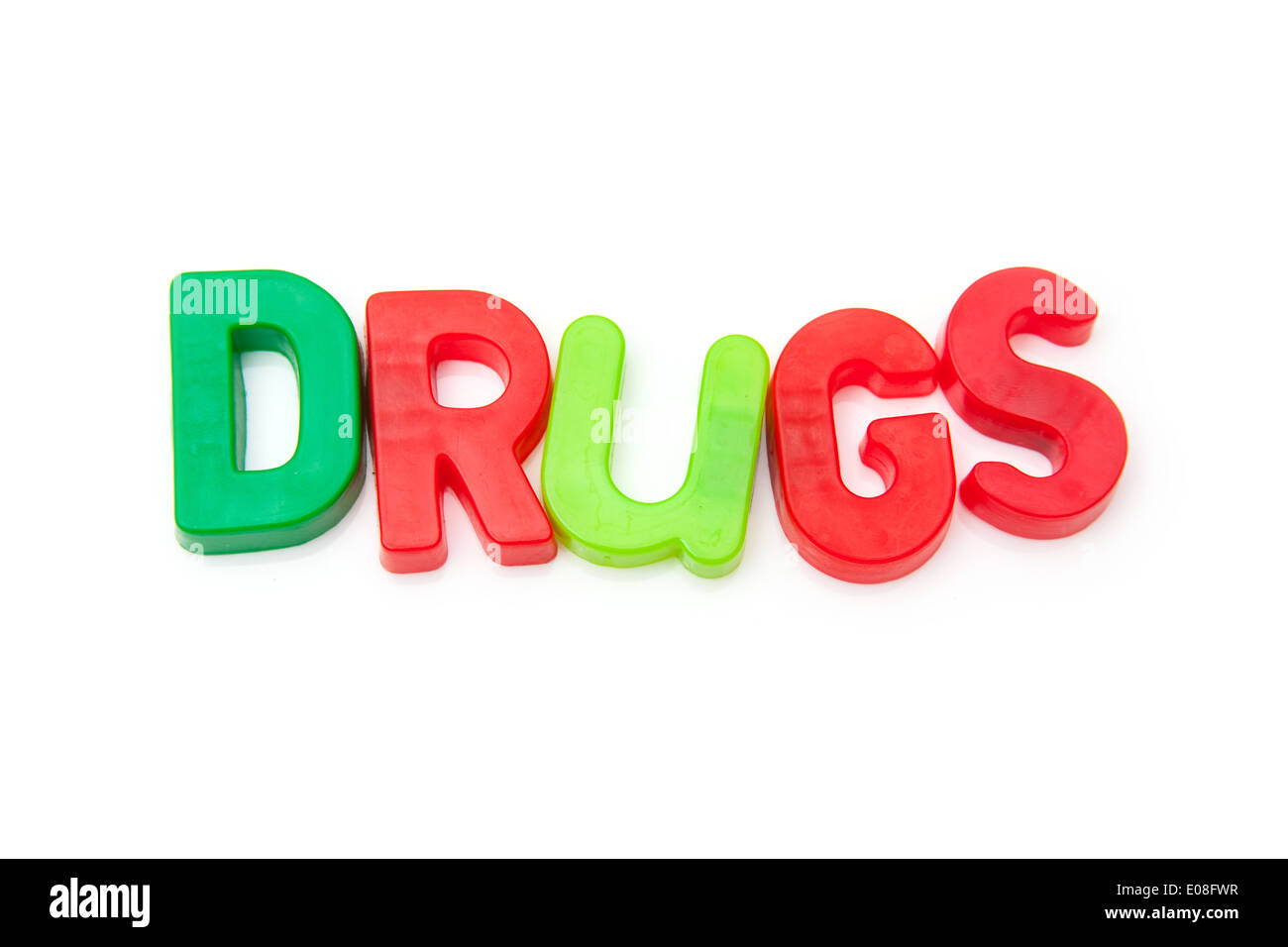 Drugs written in magnetic letters on a white studio background Stock ...