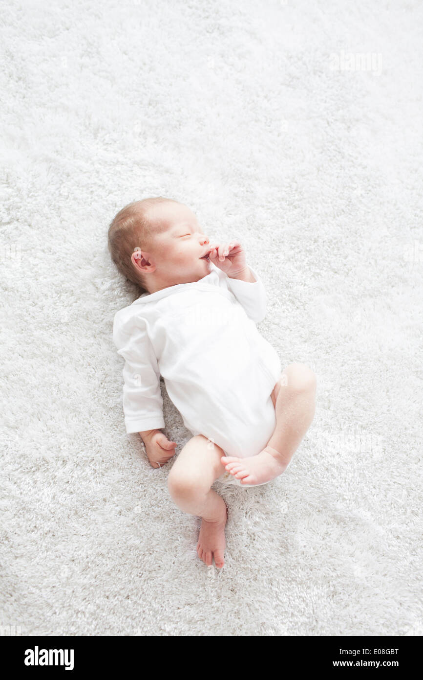Caucasian baby laying smiling on hi-res stock photography and images ...