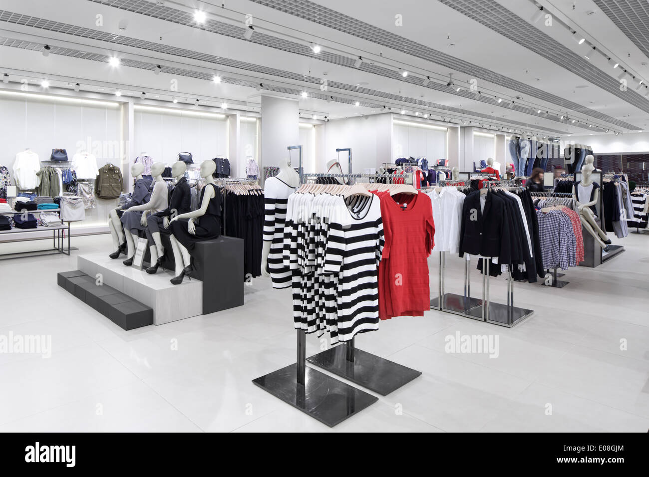 luxury and fashionable brand new interior of cloth store Stock Photo ...
