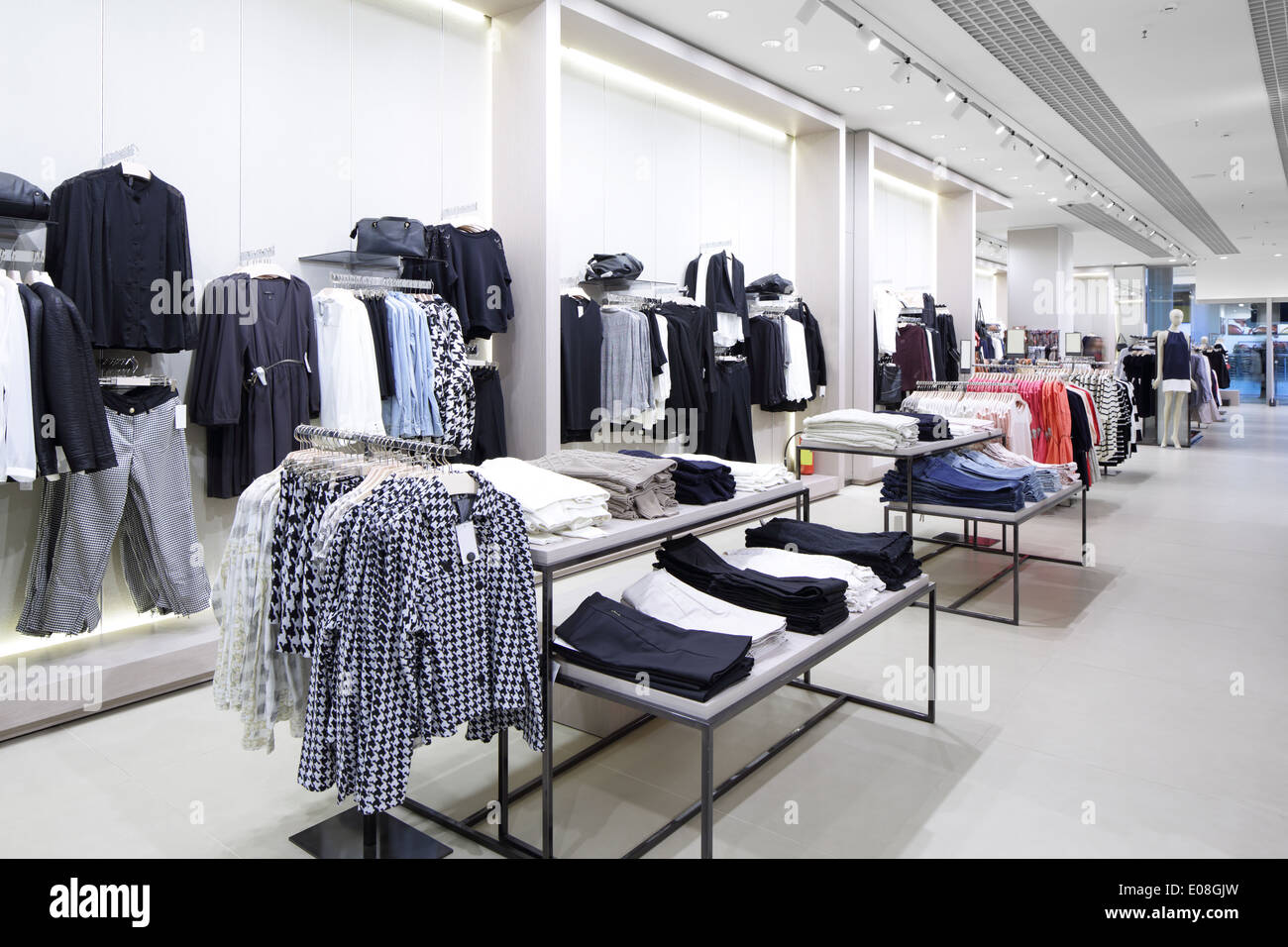 luxury and fashionable brand new interior of cloth store Stock Photo ...