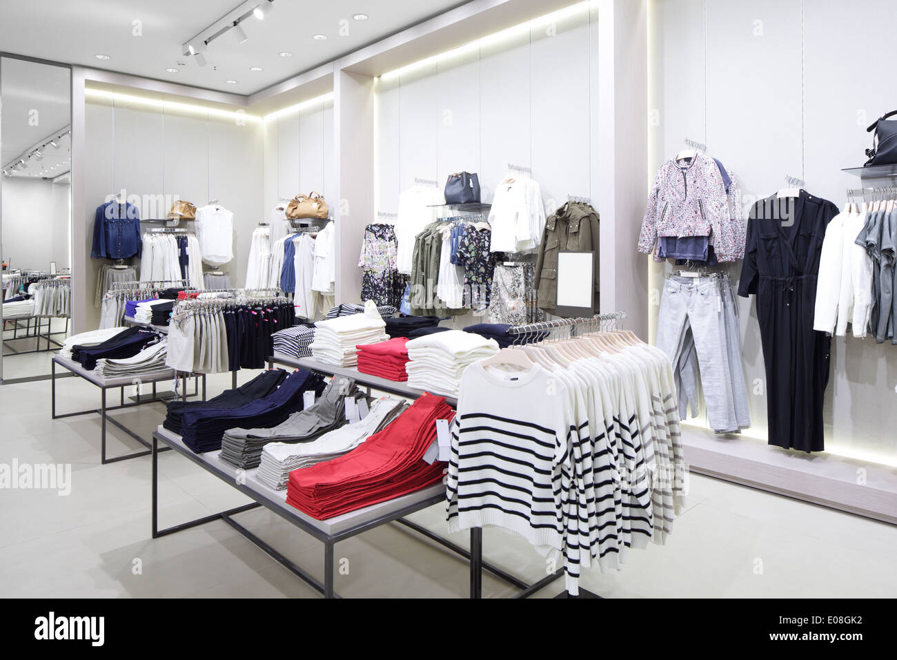 luxury and fashionable brand new interior of cloth store Stock Photo ...