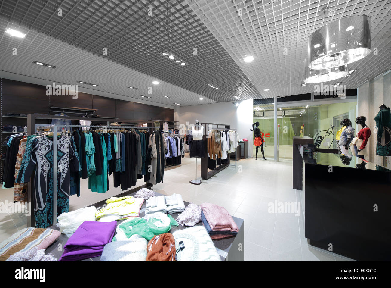 luxury and fashionable brand new interior of cloth store Stock Photo ...