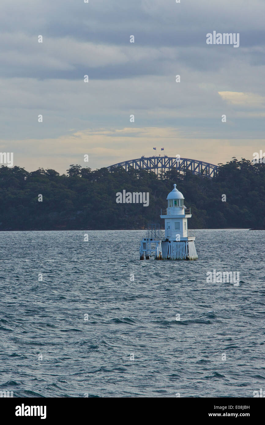 Small Harbour Lighthouse and The Sydney Harbour Bridge. Sydney Stock ...