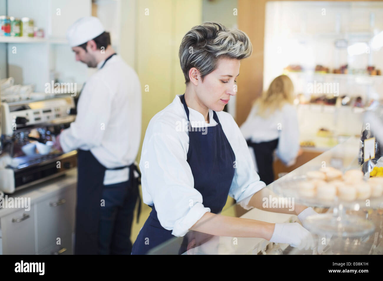 Adult adults woman women working work works hi-res stock photography ...