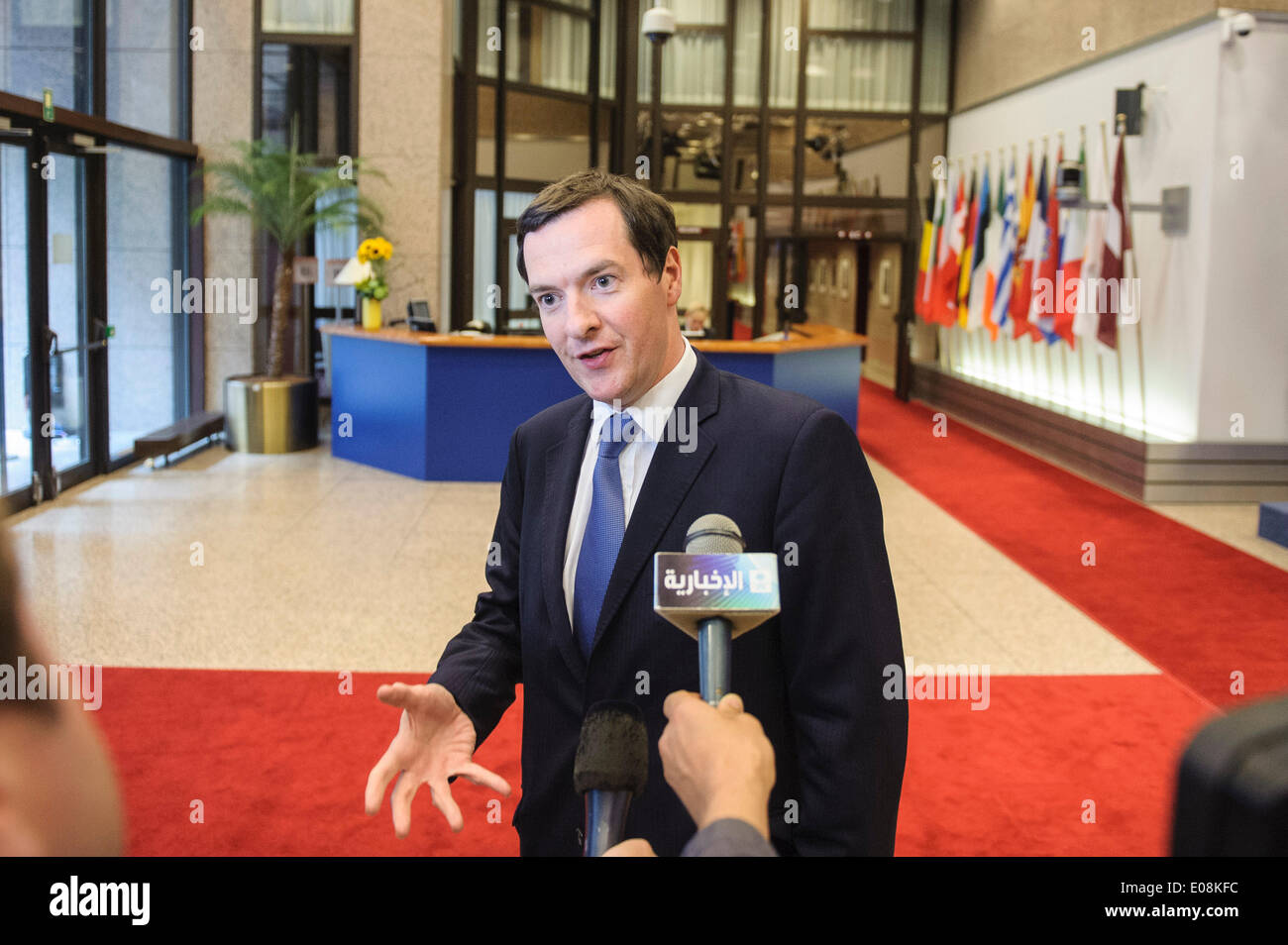 British Chancellor of the Exchequer George Osborne talks to the press ...