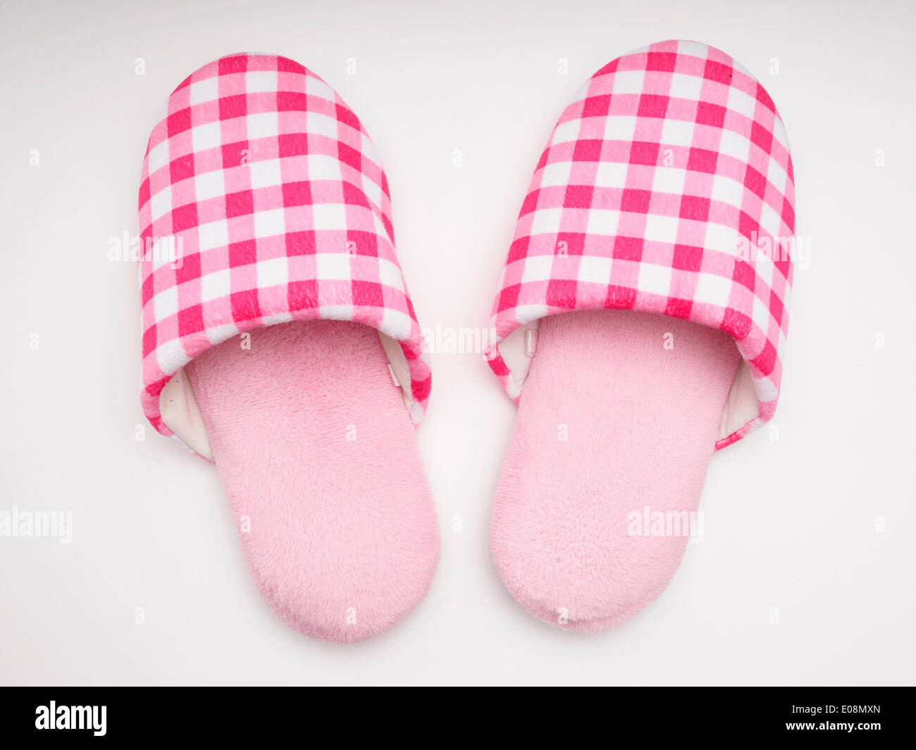 Pink slippers cut out isolated on white background Stock Photo - Alamy