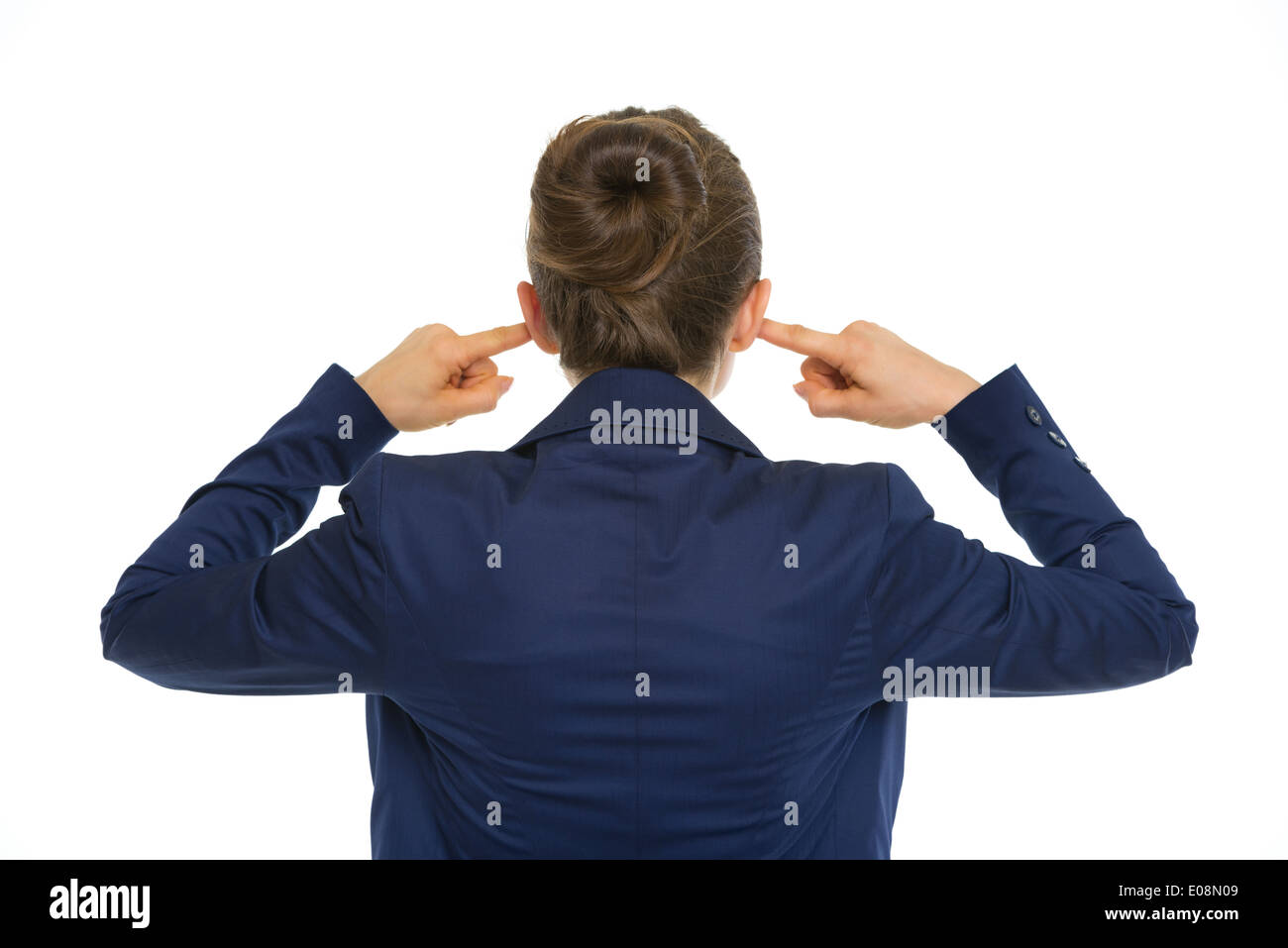 Business woman closing ears. rear view Stock Photo - Alamy