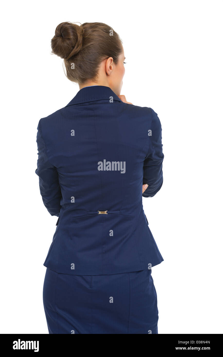 Thoughtful business woman. rear view Stock Photo - Alamy