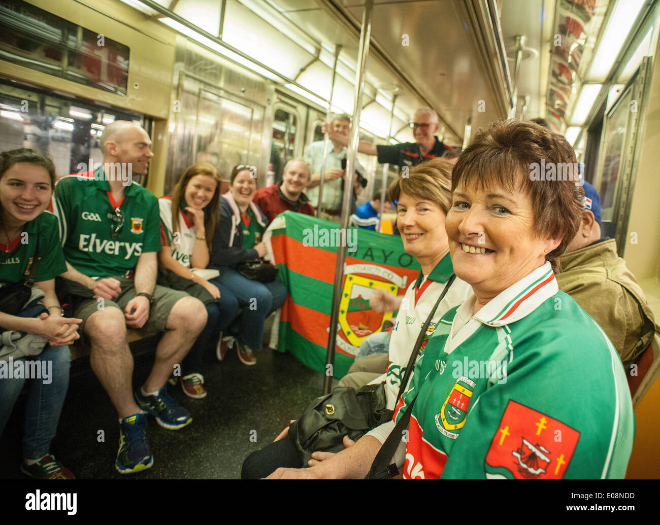 Football (soccer) fans travel on the IRT Number 1 subway train up to ...