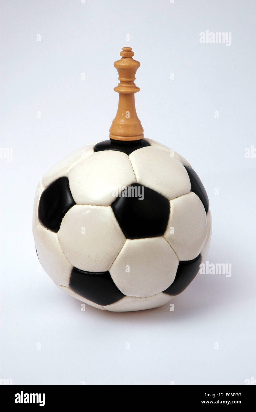Illustration - A white king chess piece stands on a soccer ball on a ...