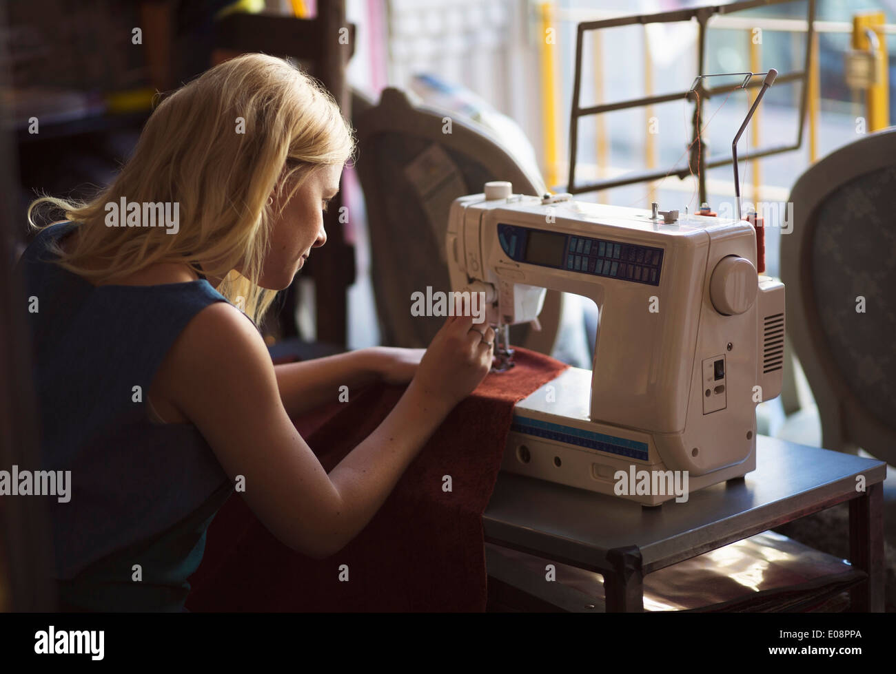 Using fabrics hi-res stock photography and images - Alamy