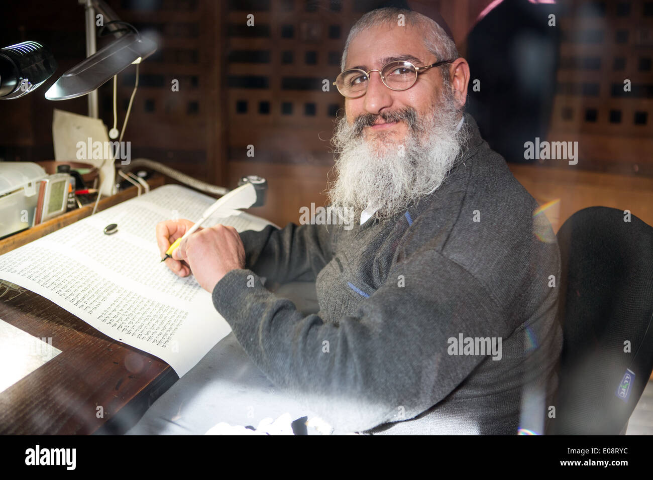 A Jewish Rabbi writing Torah pages Stock Photo - Alamy