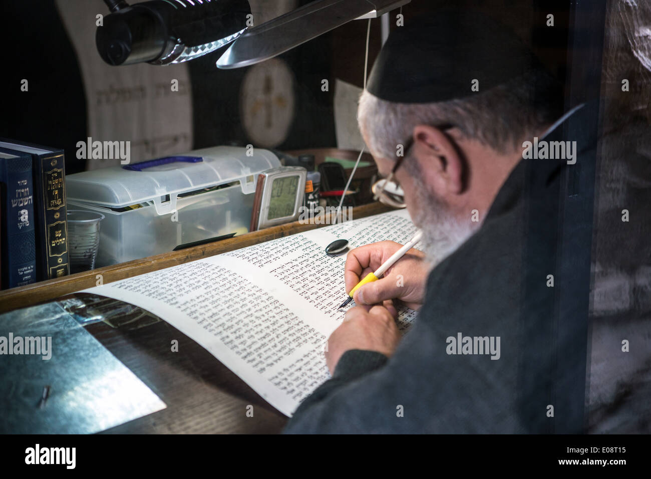 A Jewish Rabbi writing Torah pages Stock Photo - Alamy