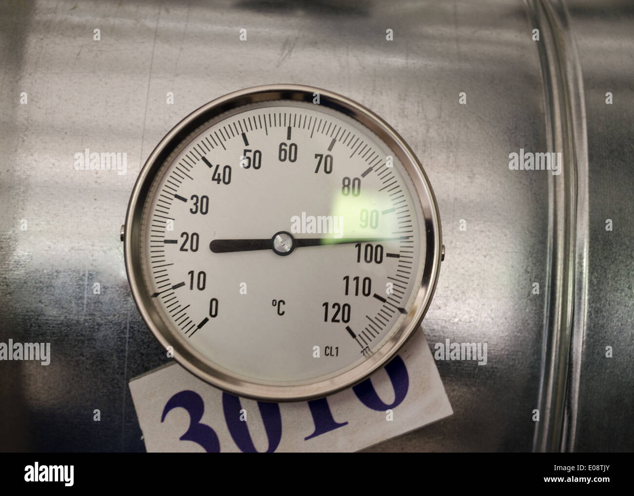 Circular industrial thermometer temperature meter show almost hundred ...