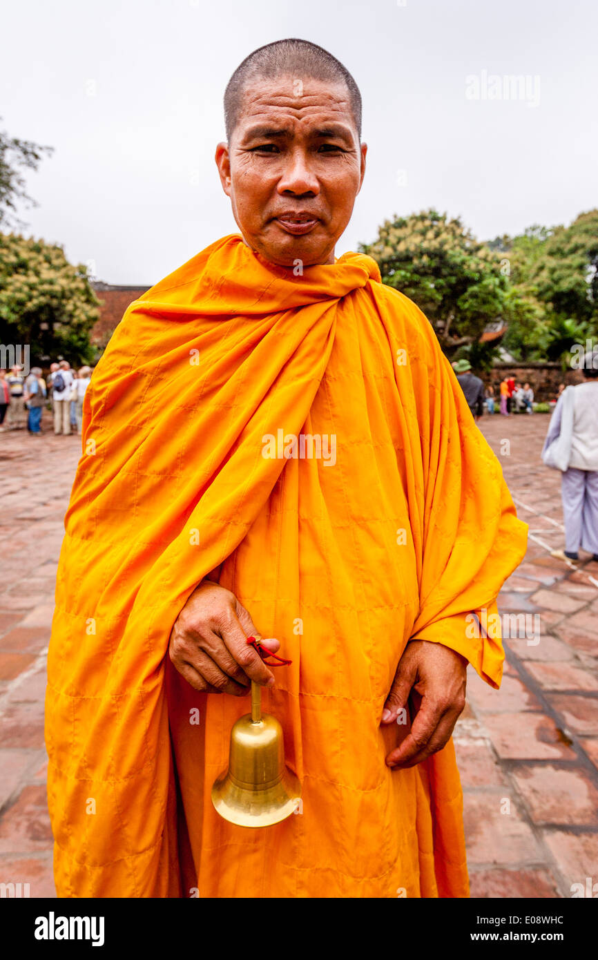 A Buddhist Monk Ringing His Bell, Temple Of Literature, Hanoi, Vietnam ...