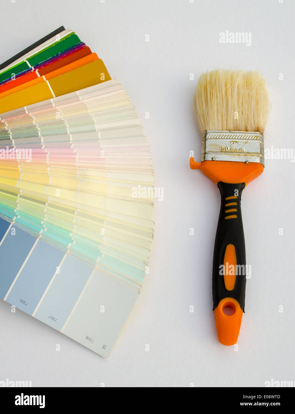 pastel shade color palette chart and working paint brush on white ...