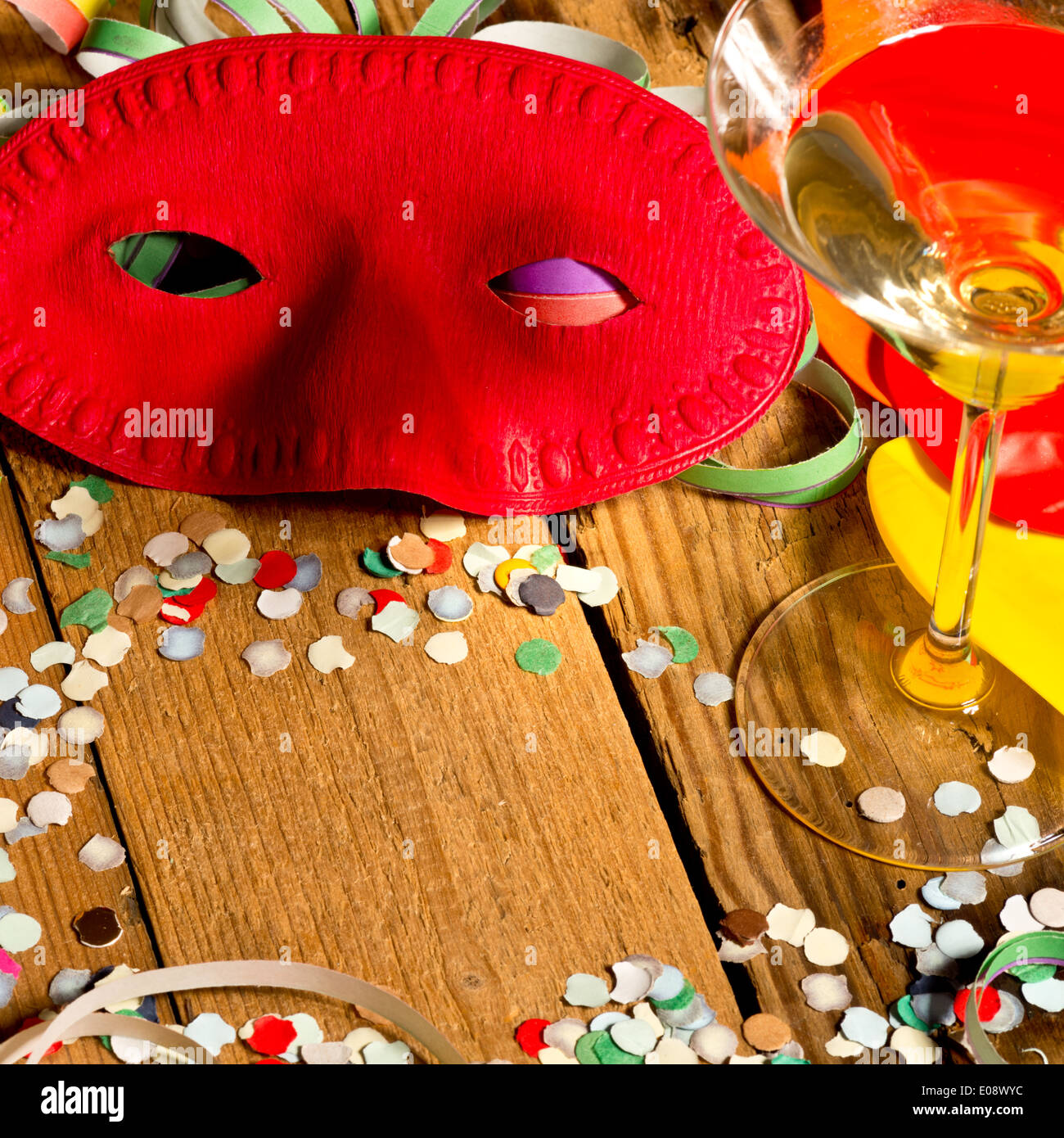 Still life with carnival mask and colored glitter Stock Photo - Alamy