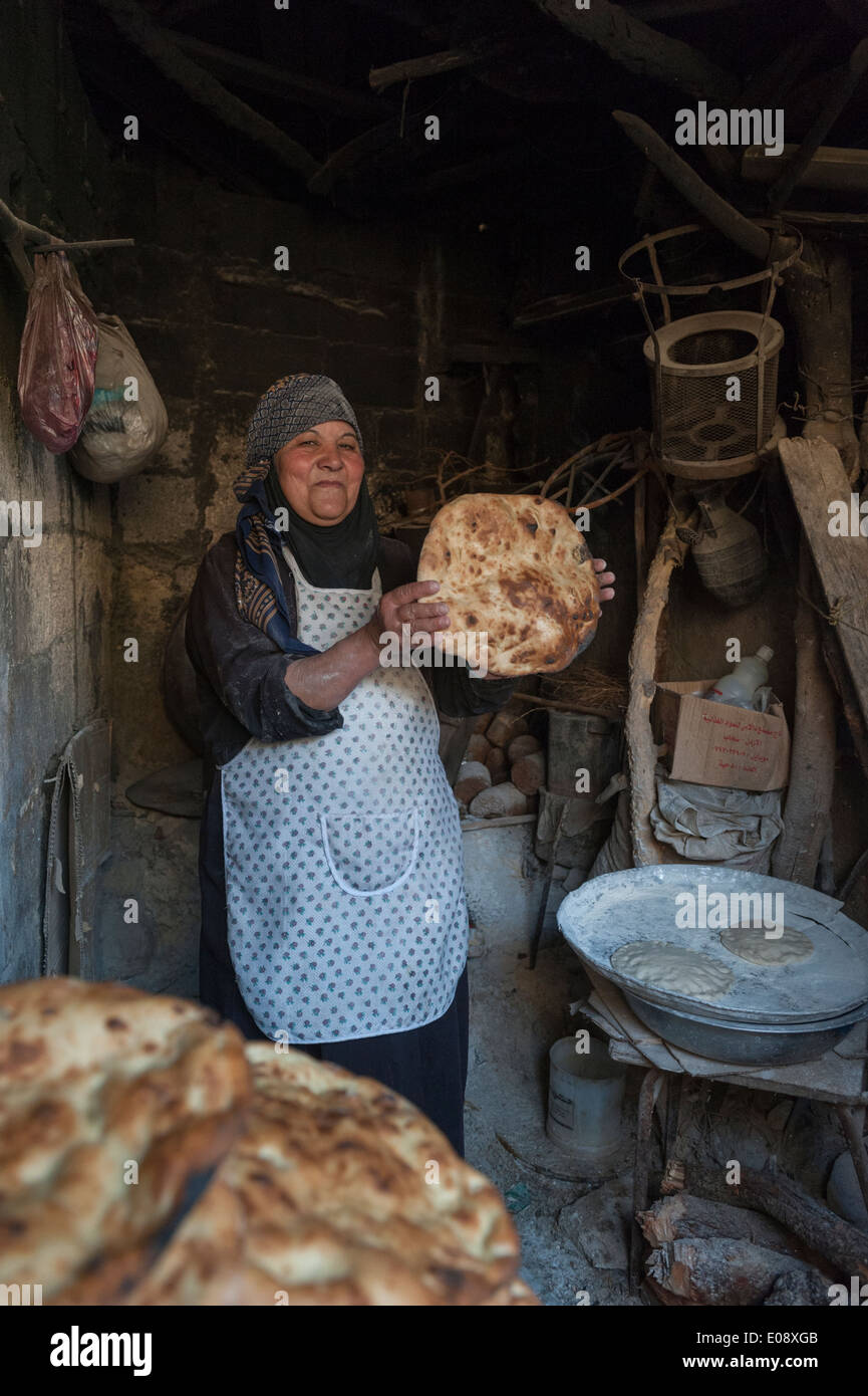 Woman baker. Orjan village. Al Ayoun Trail. Jordan. Middle East Stock ...