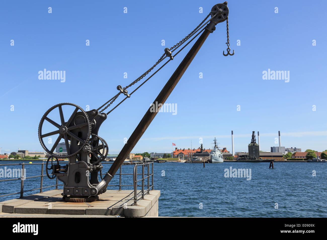 Old slewing crane on harbour waterfront with view to Christianshavn ...