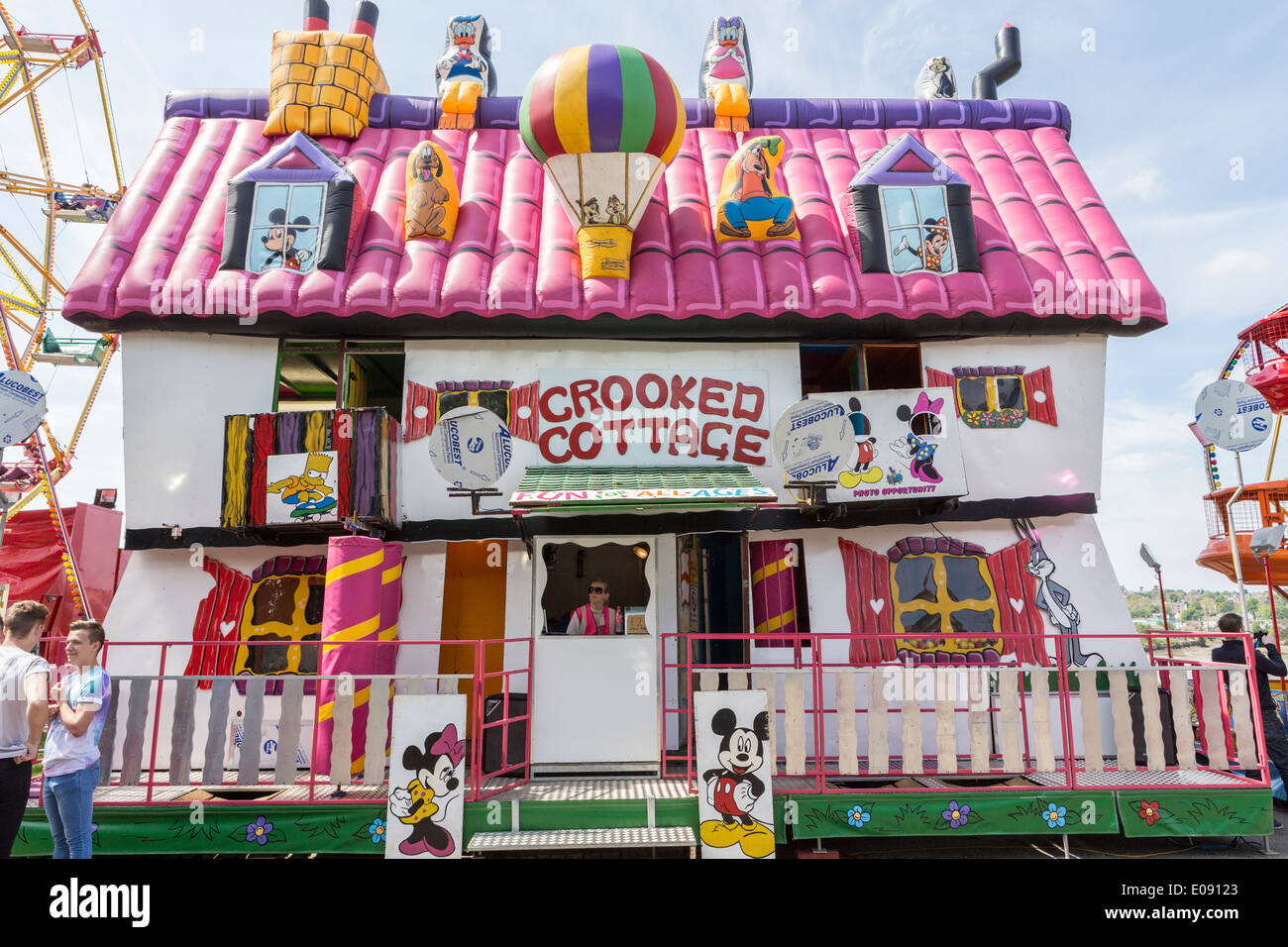 Crooked Cottage Attraction at Funfair Stock Photo - Alamy