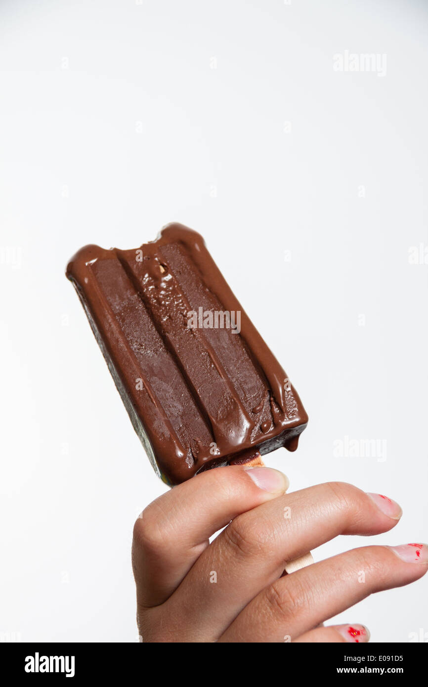 Melted Chocolate Bar In Hand